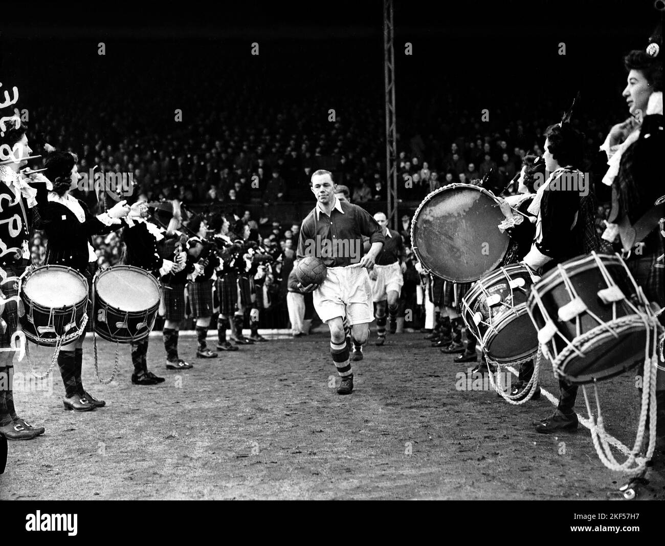 Charlton Athletic's Bert Johnson runs out onto the pitch through a ...