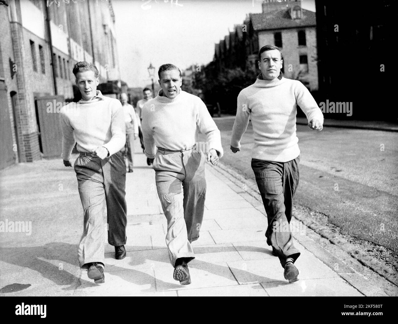 (L-R) Arsenal's Archie MacAulay, Laurie Scott and Reg Lewis take a ...