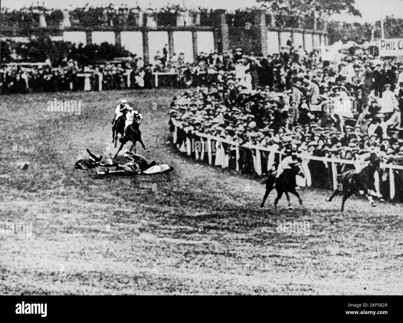 Suffragette Emily Davison lies on the ground after attempting to grab ...