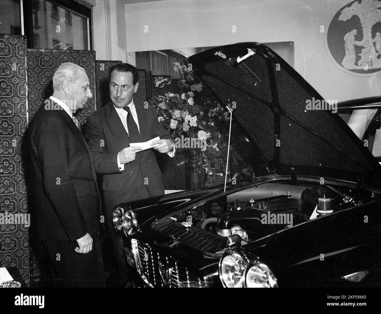 (L-R) Racing driver Jack Fairman shows Italian Ambassador Vittorio ...
