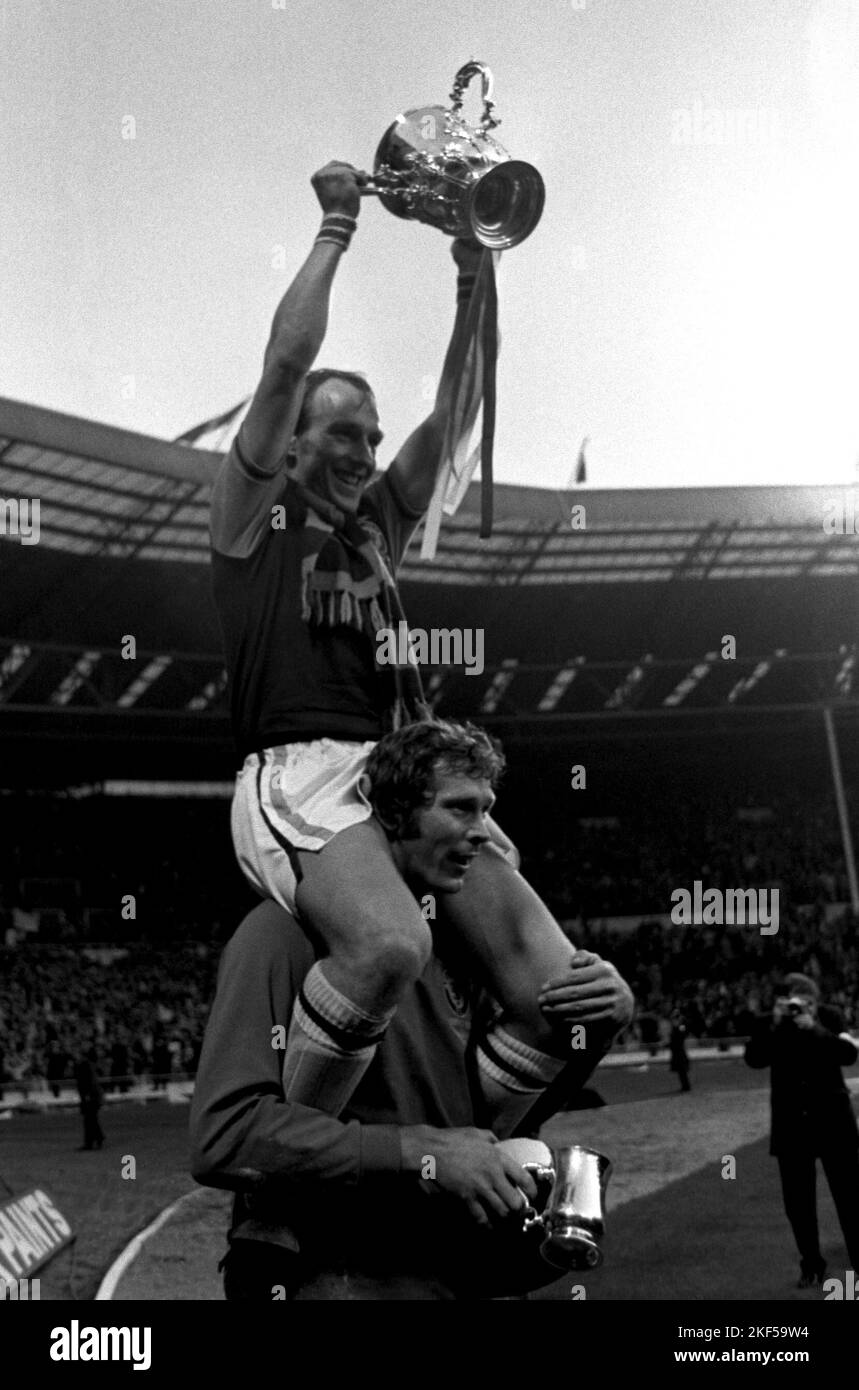 Aston Villa's winning goalscorer Ray Graydon (top) shows off the League ...