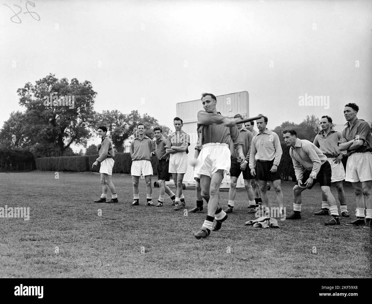 England's Dennis Wilshaw aims for the photographer during a game of ...