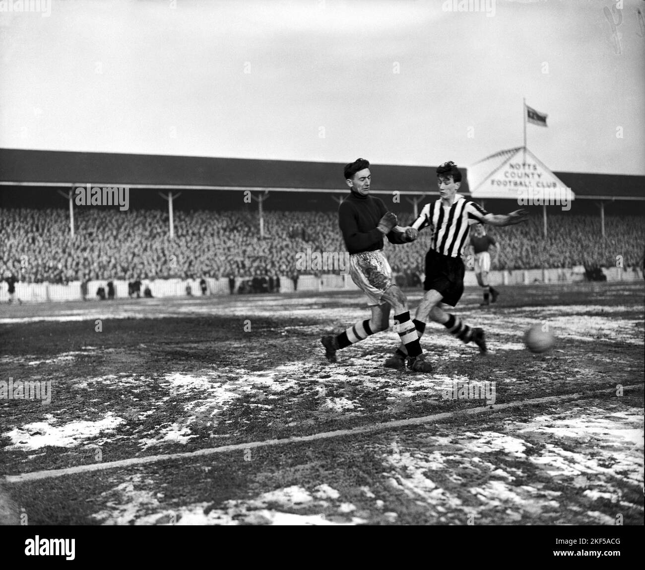 (L-R) Chelsea goalkeeper Chic Thomson clears from Notts County's Gordon ...
