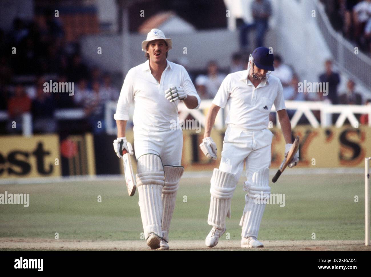 (L-R) England's Ian Botham and Derek Randall walk off at the tea ...