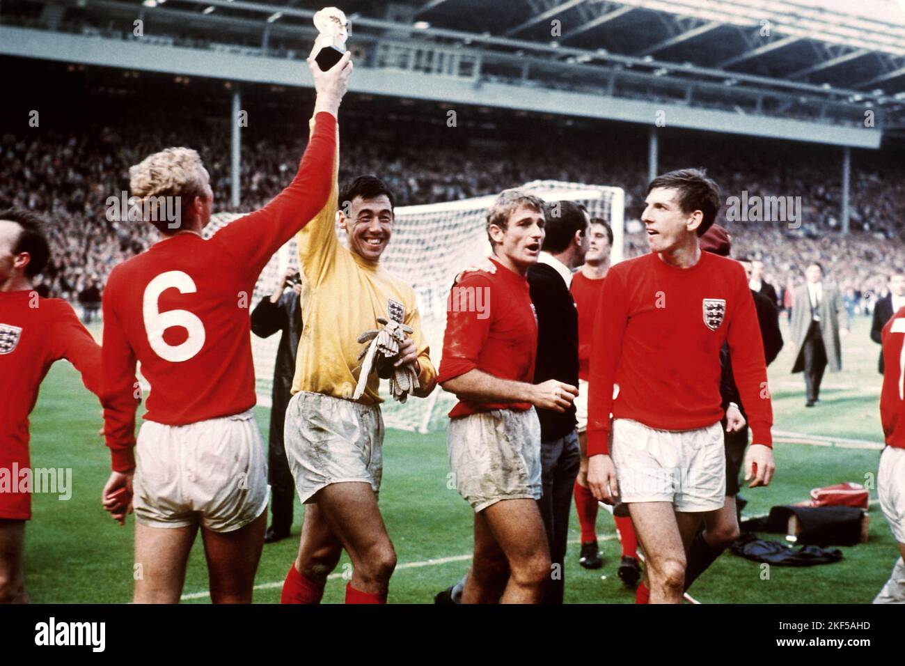 (L-R) England captain Bobby Moore tries to retrieve the Jules Rimet ...