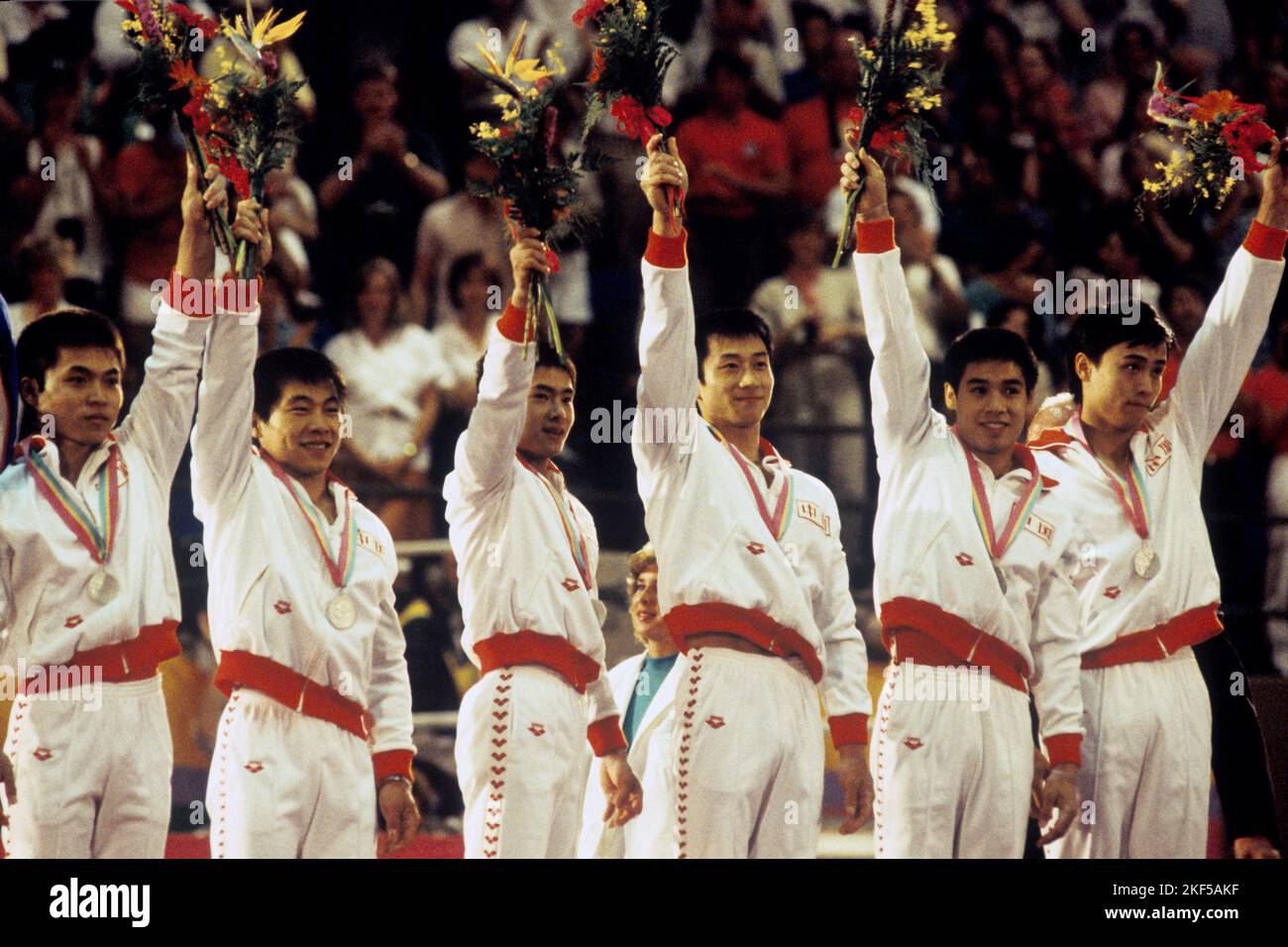 The Chinese team winning the silver medal in the Team Competition Stock ...
