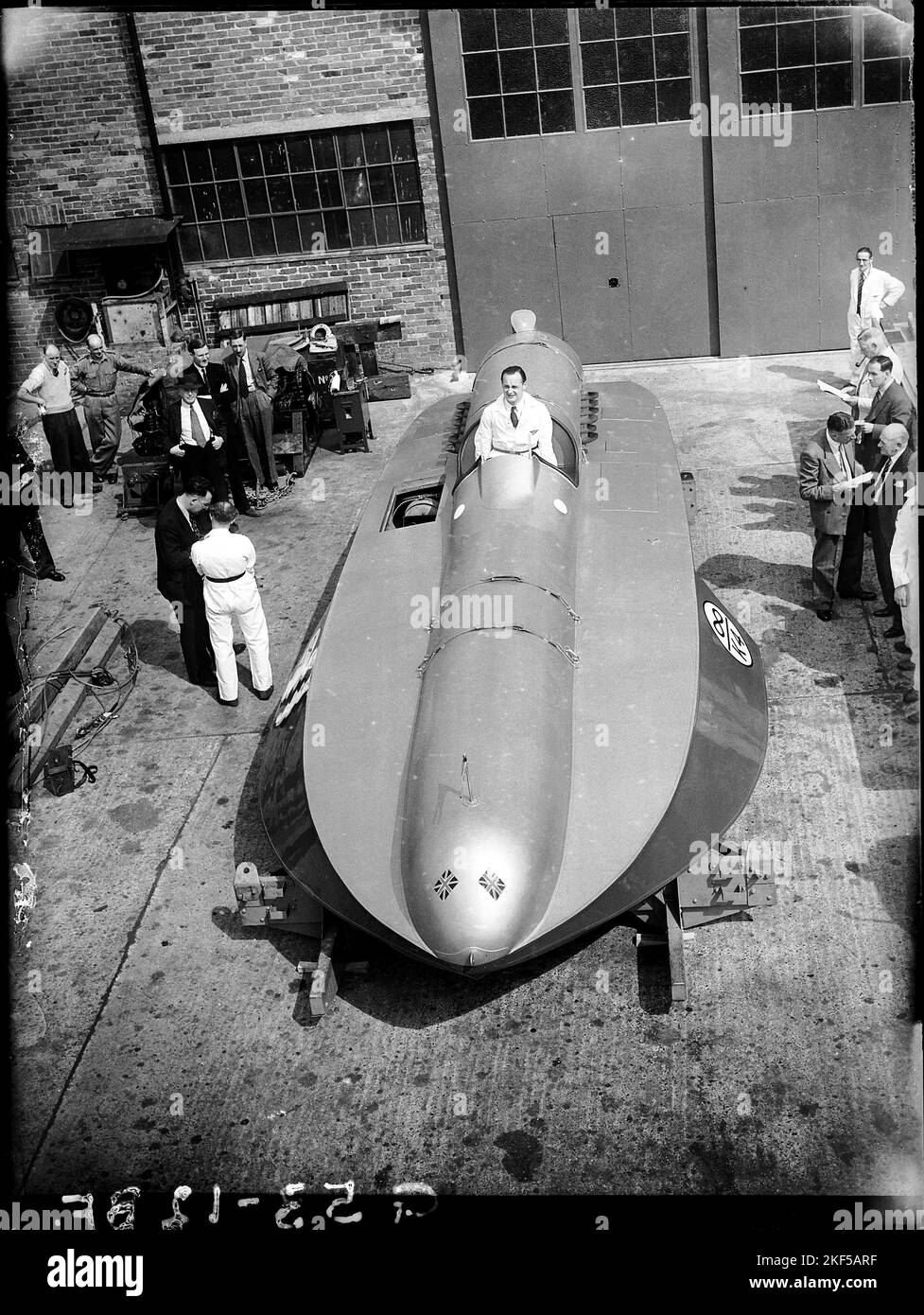 Donald Campbell sitting in his jet-propelled speedboat, Bluebird K4 ...