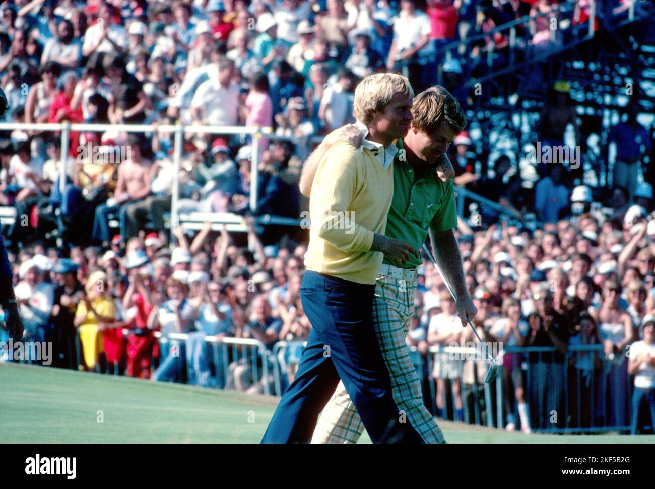Open Champion Tom Watson (r) walks off the 18th green with runner up ...