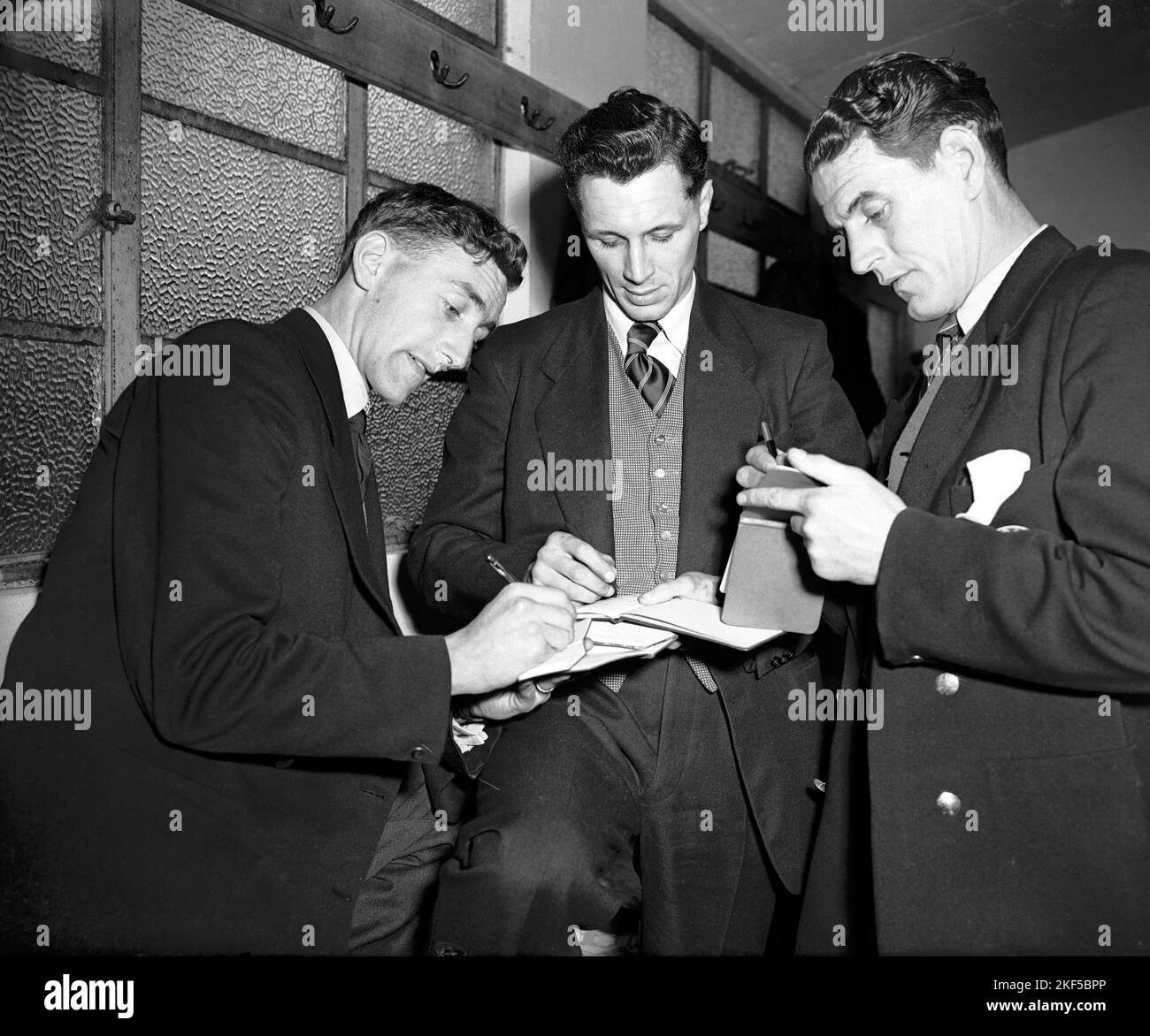 (L-R) Chelsea's Chic Thomson, Jim Lewis and Stan Willemse sign ...
