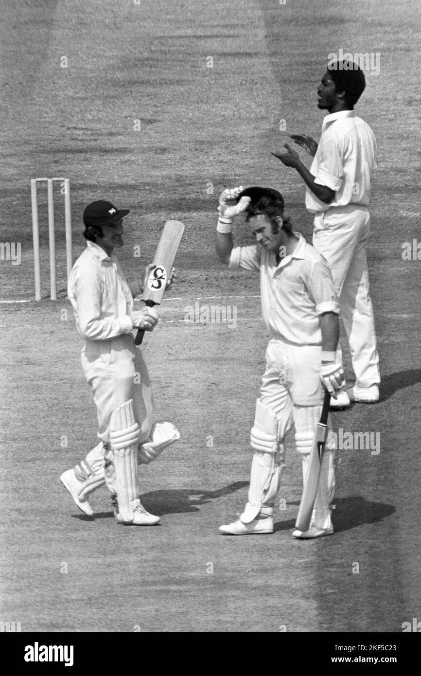 Dennis Amiss after scoring 200 is applauded by Alan Knott and Michael ...