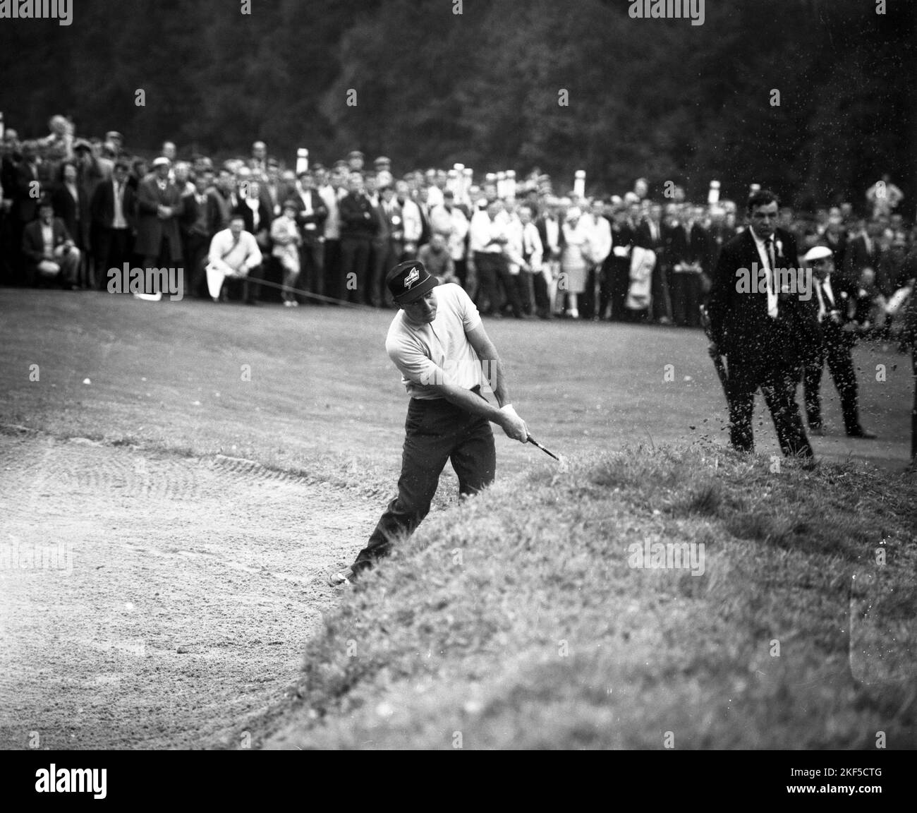 South Africa's Gary Player plays out of a bunker onto the 15th green ...