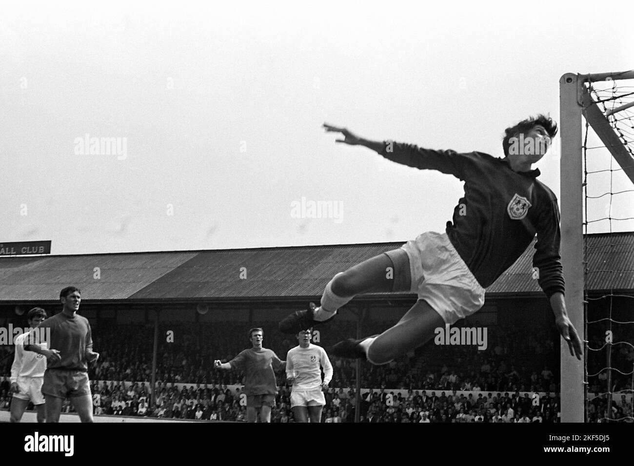 Millwall's goalkeeper Bryan King turns the ball over the bar for a ...