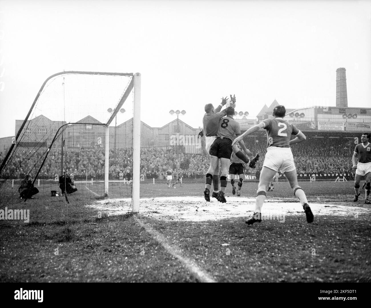 (L-R) Birmingham City goalkeeper John Schofield fumbles the ball under ...