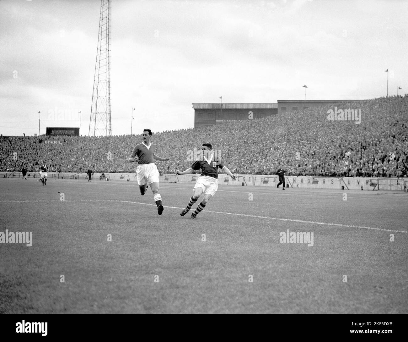 Birmingham City's Alex Govan (r) crosses the ball past Chelsea's Ian ...