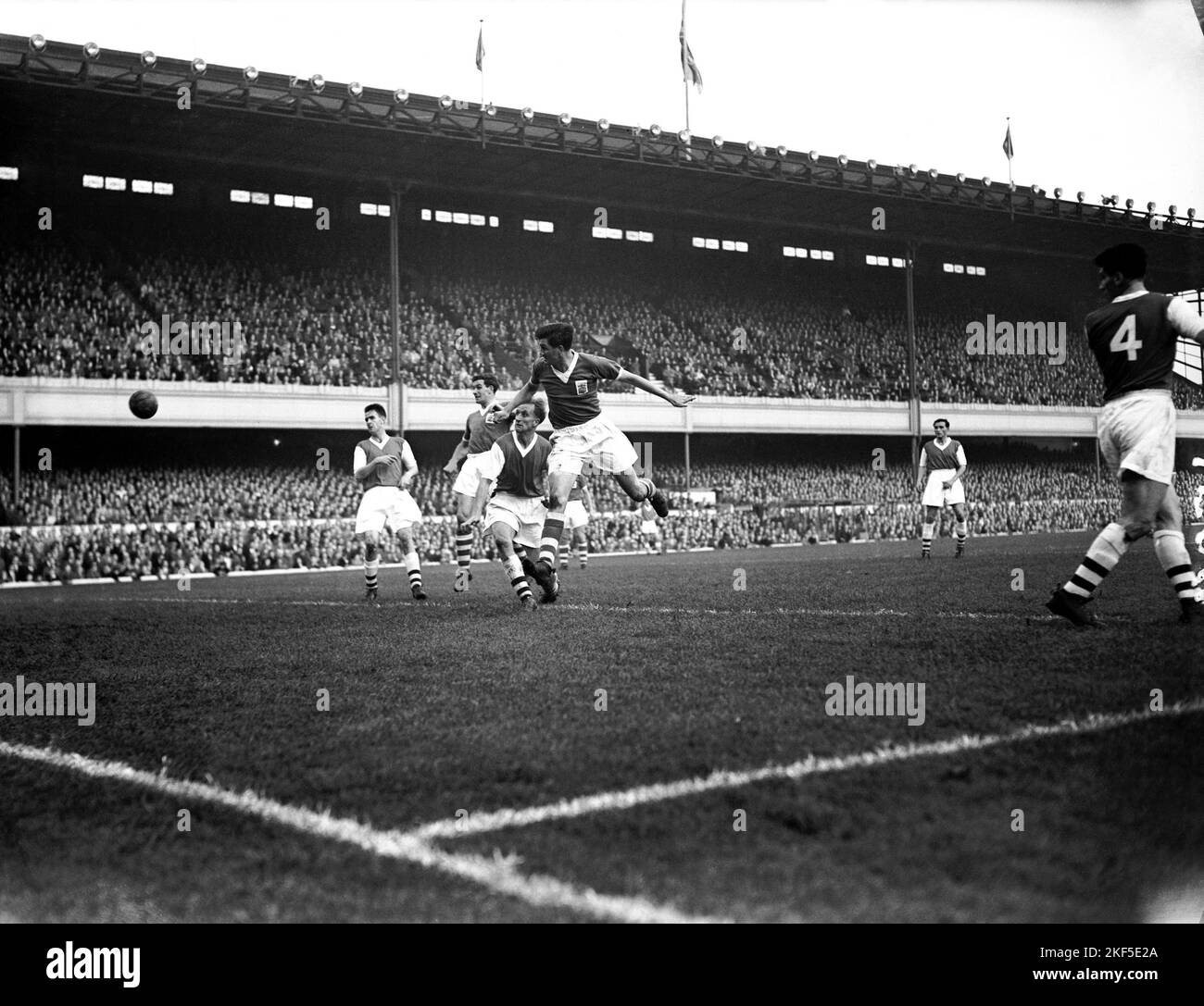 Birmingham City's Dick Neal (fourth l) powers a header at goal Stock ...