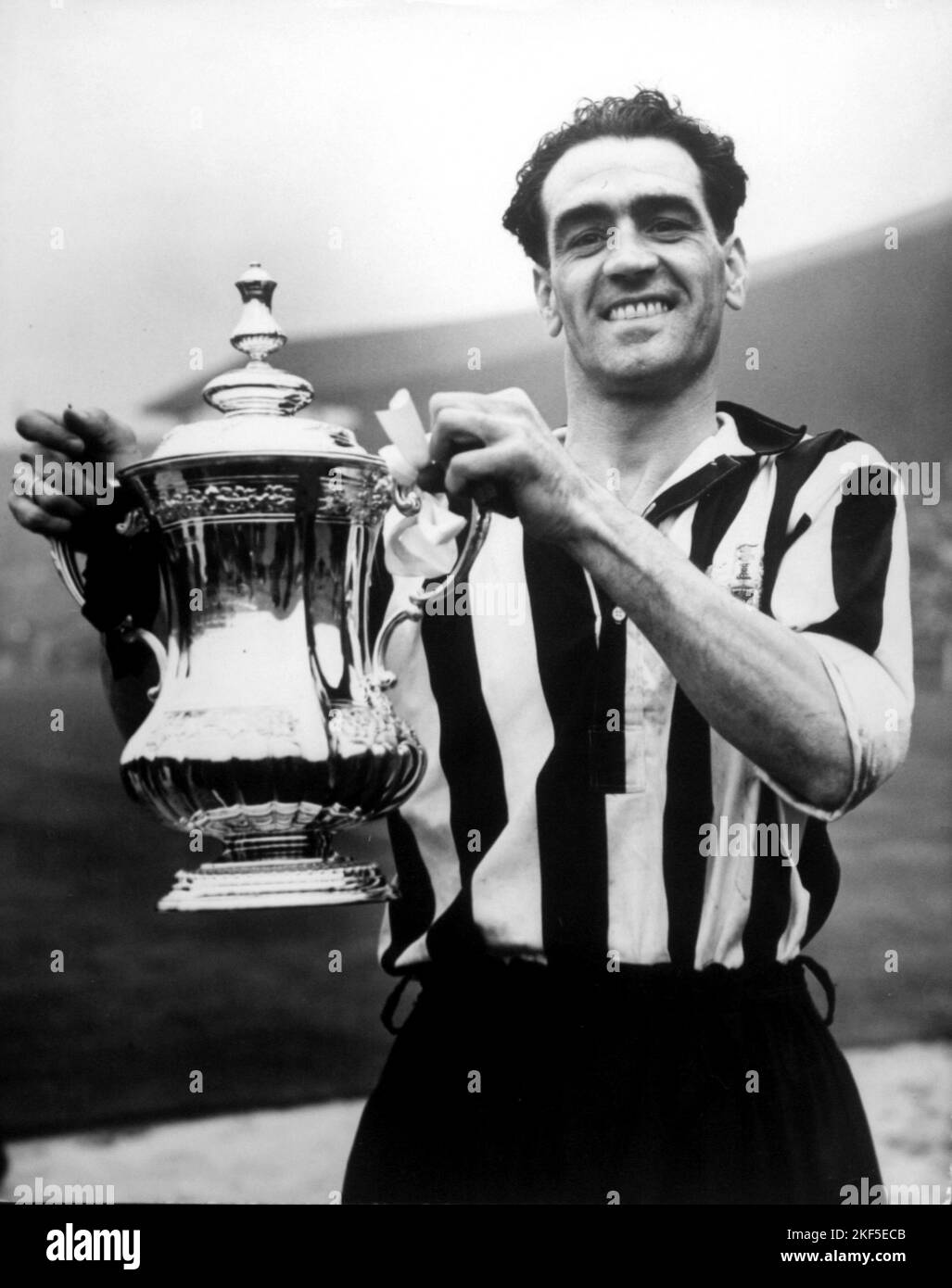 Newcastle United captain Joe Harvey shows off the FA Cup after his team ...