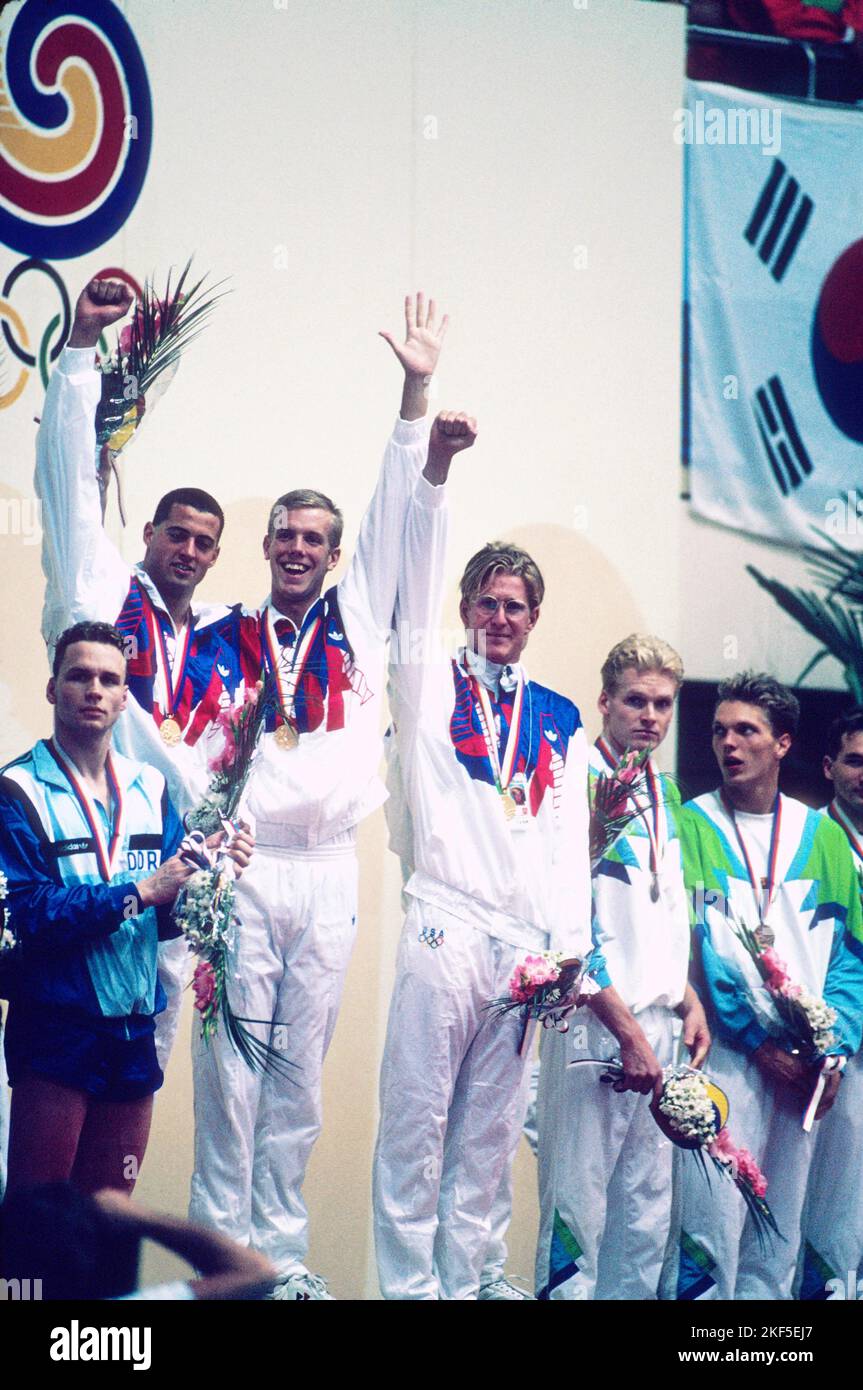The USA team celebrate with their gold medals. The team was Christopher ...