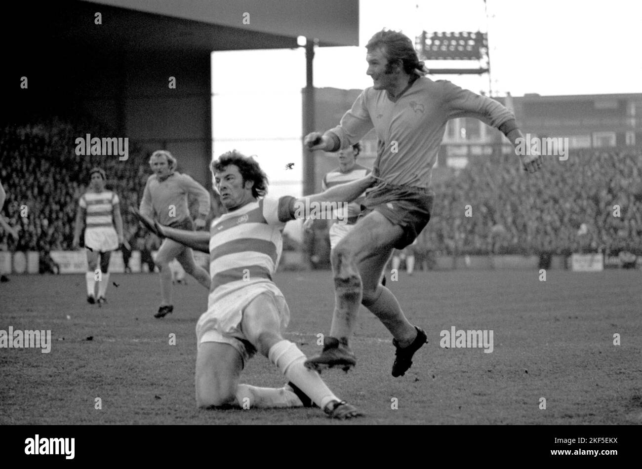 Queens Park Rangers' Ian Gillard tries to tackle Derby County's ...