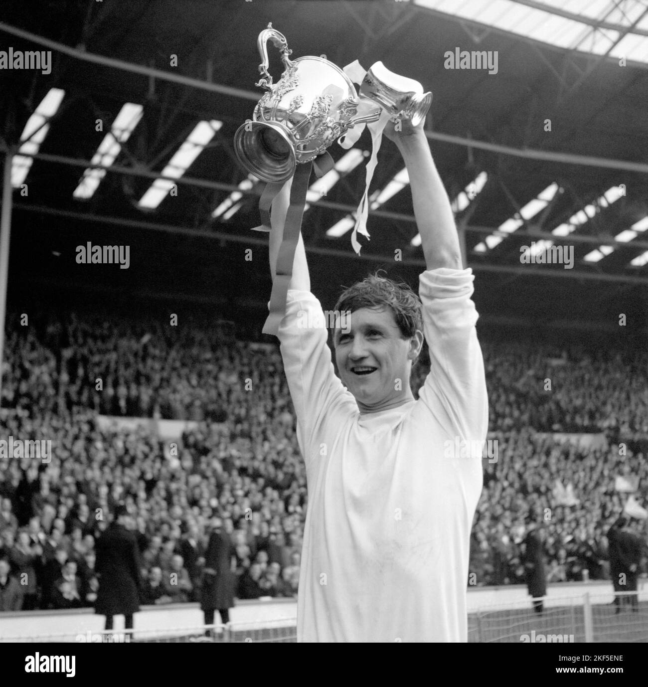 Queens Park Rangers' Mike Keen celebrates with the Football League Cup ...
