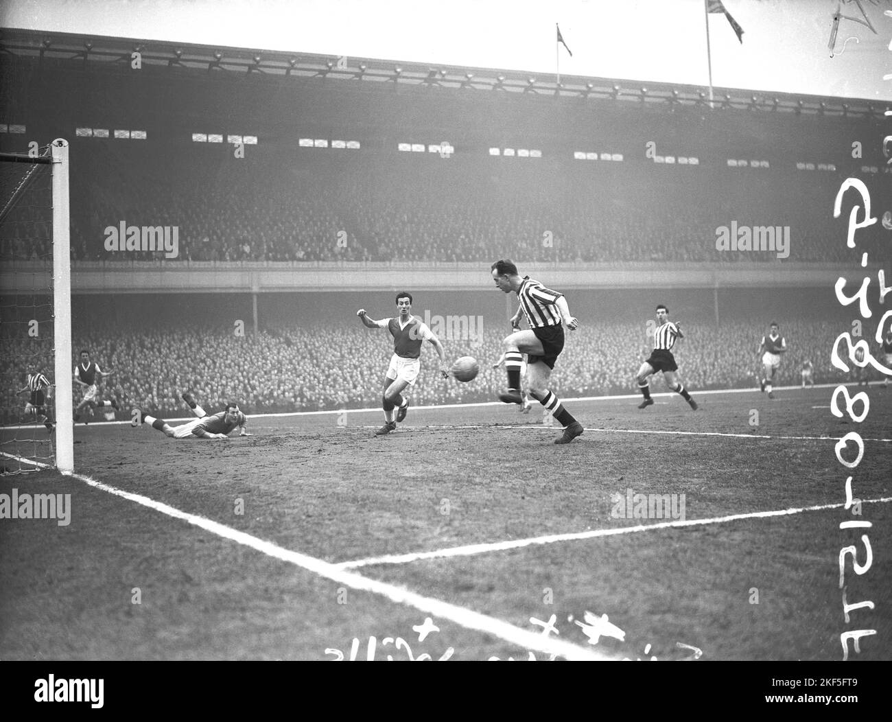 (L-R) Arsenal's Jack Kelsey and Len Wills can only look on as Sheffield ...