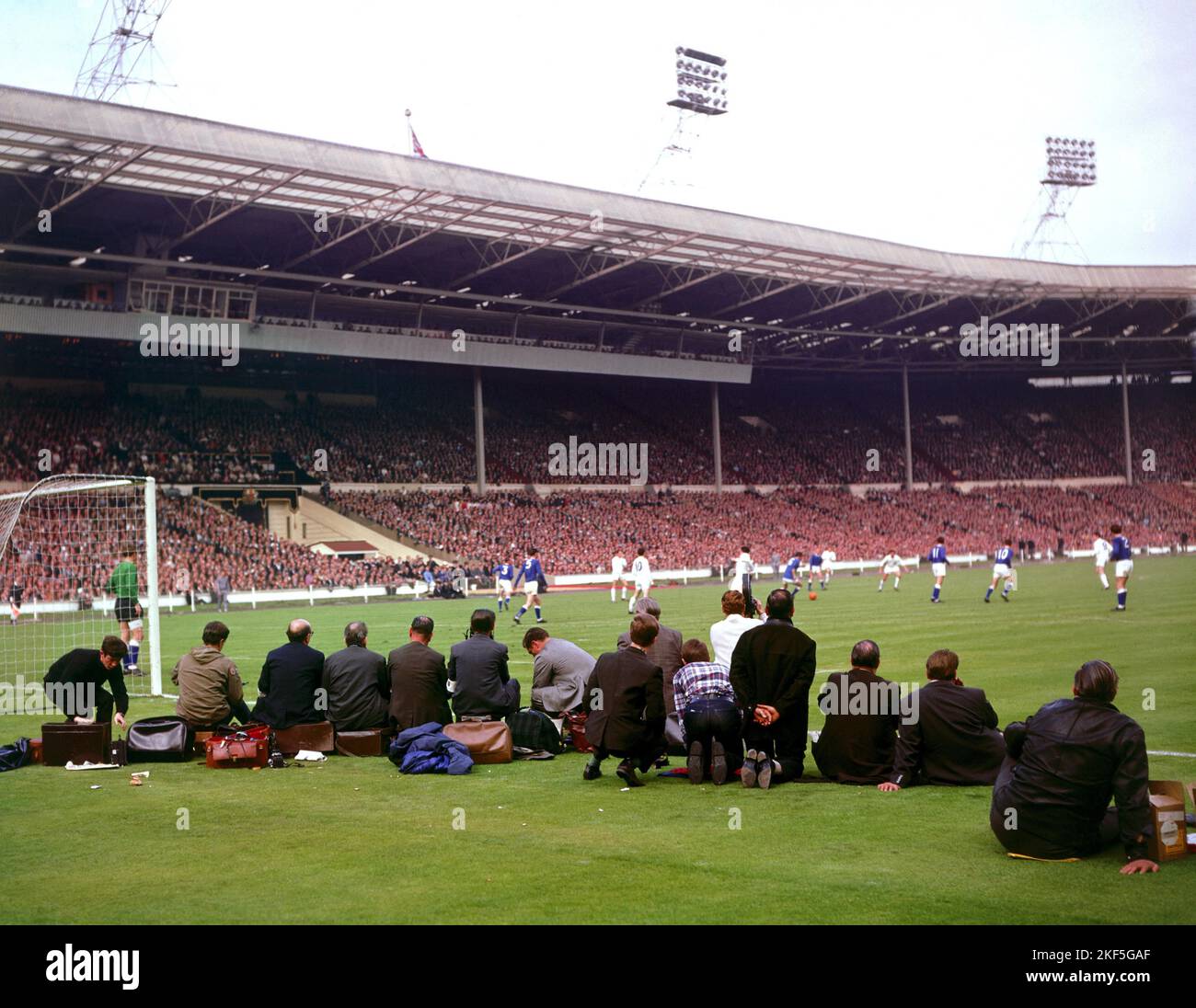 The ranks of photographers and cameramen to one side of the Everton ...