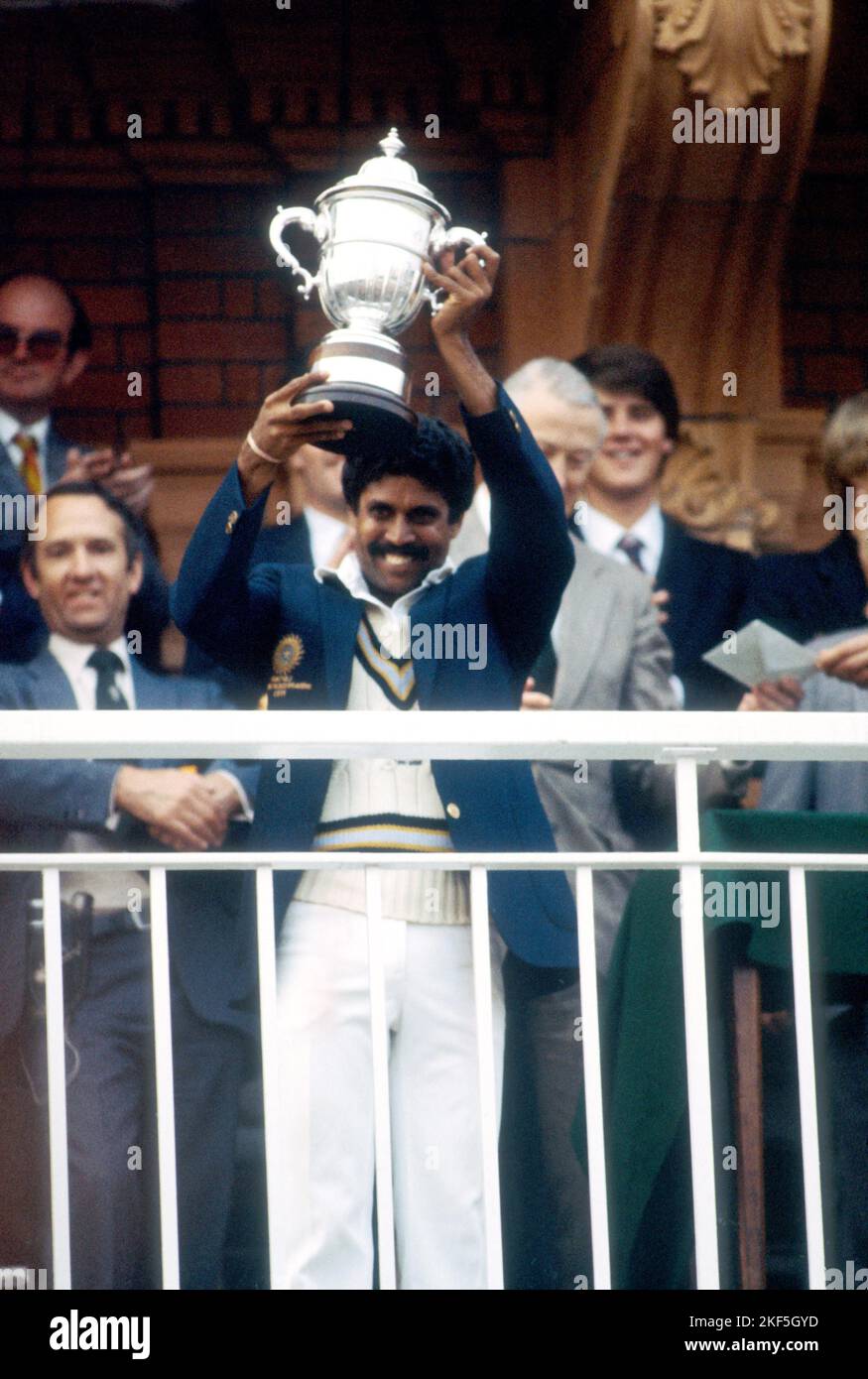 India captain Kapil Dev holds the Prudential World Cup aloft for the ...