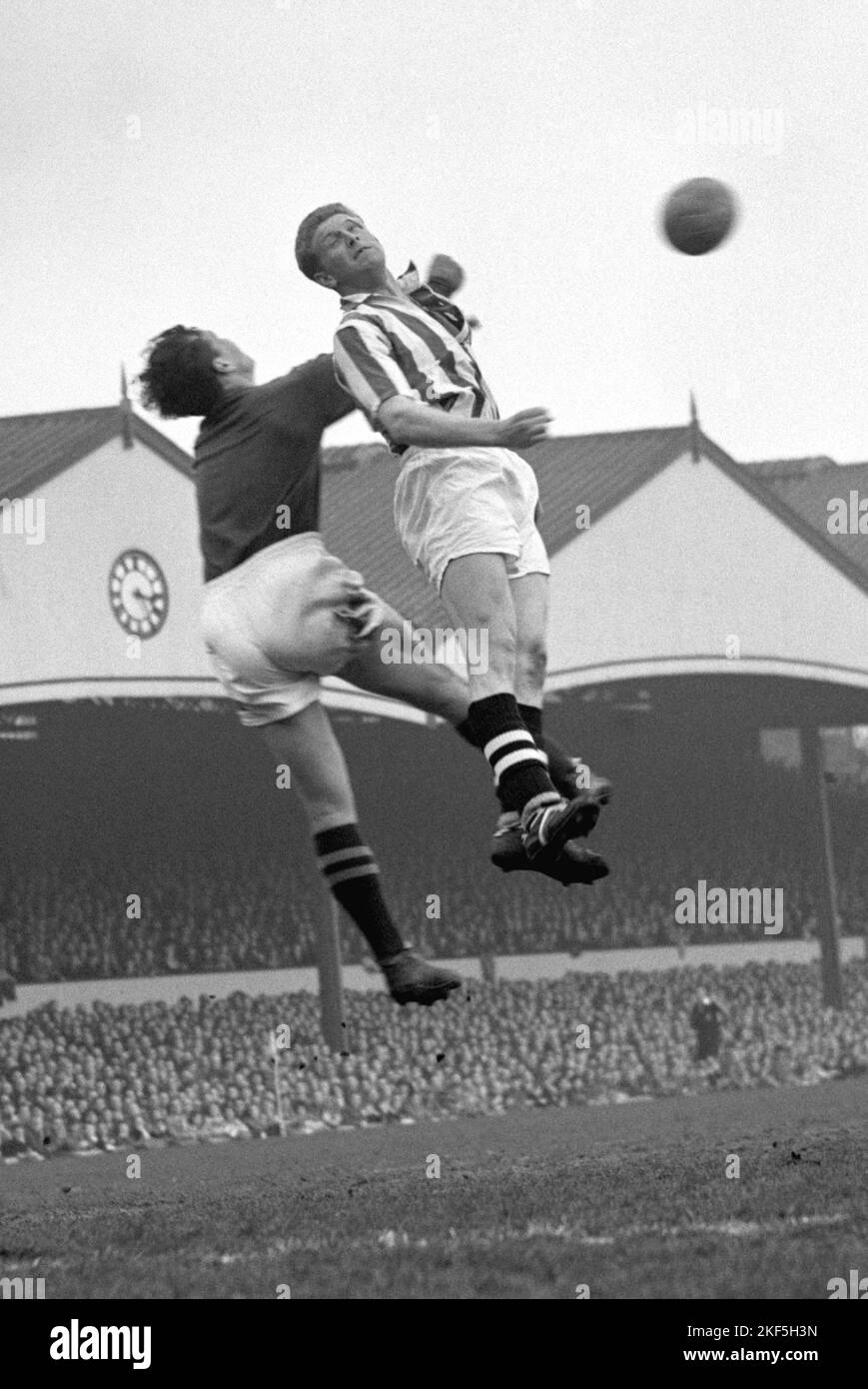 (L-R) Aston Villa goalkeeper Nigel Sims punches clear from West ...