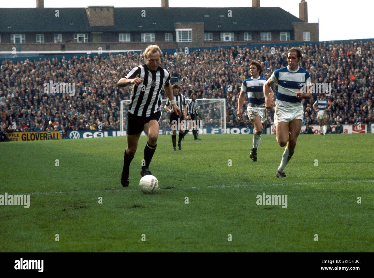 (L-R) Newcastle United's John Tudor is pursued by Queens Park Rangers ...