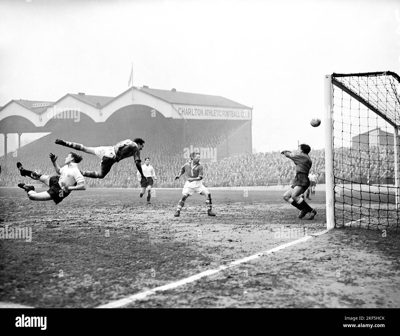Charlton Athletic's Johnny Summers (second l) brings a great save out ...