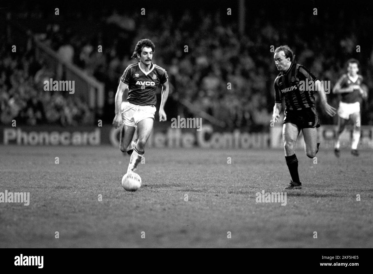 (L-R) West Ham United's Alan Devonshire makes a forward run as ...