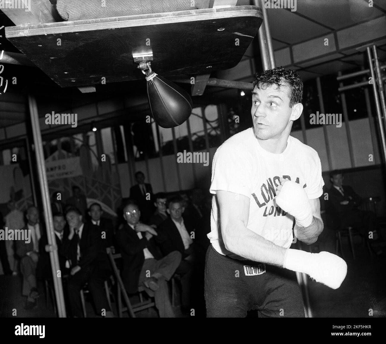 World Middleweight Champion Paul Pender works the speedball Stock Photo ...