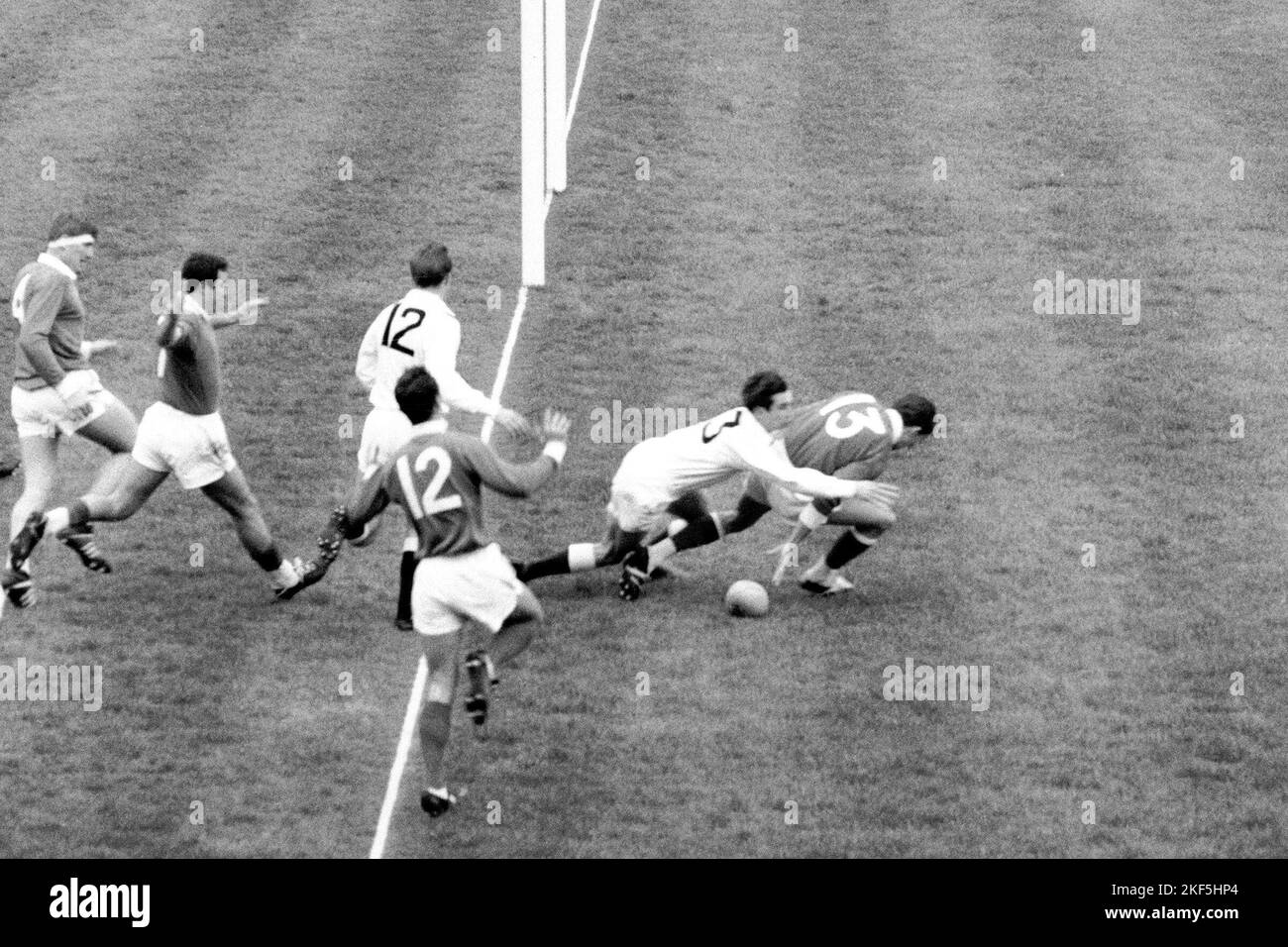 France's Claude Dourthe (r) touches down as England's Bob Hearn (second ...