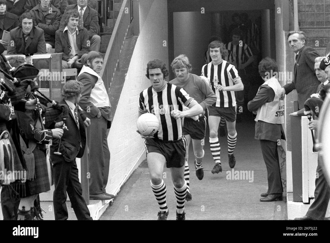 (L-R) Newcastle United captain Bobby Moncur leads his team out at ...