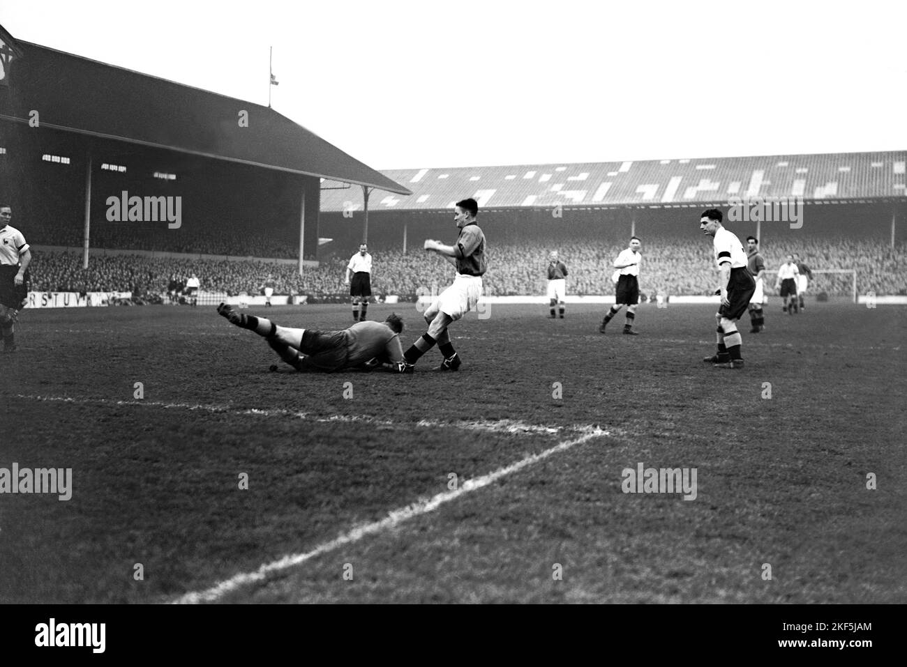 (L-R) Tottenham Hotspur goalkeeper Ted Ditchburn saves at the feet of Plymouth Argyle's Bill ...