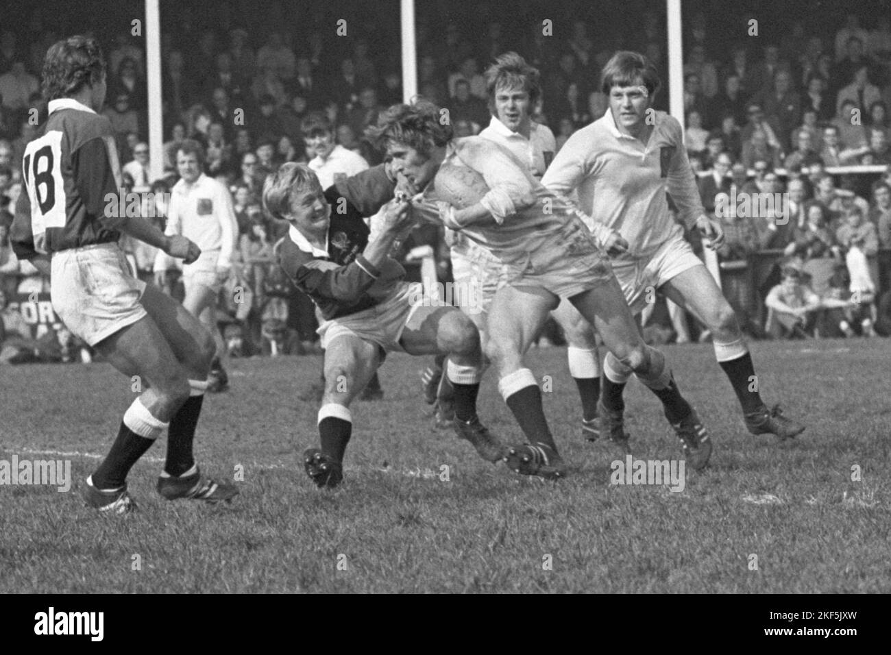 Lancashire's Tony Neary (c, r) is pulled down while in possession Stock ...