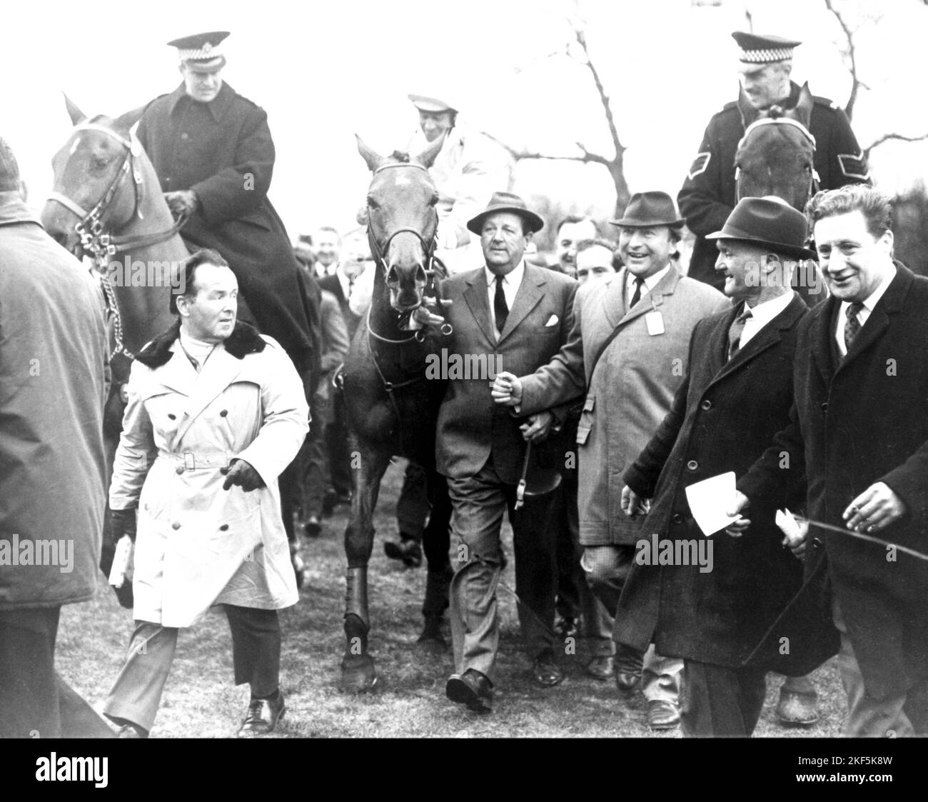 Trainer Fred Rimell (c) leads in his National winner Gay Trip, Pat ...