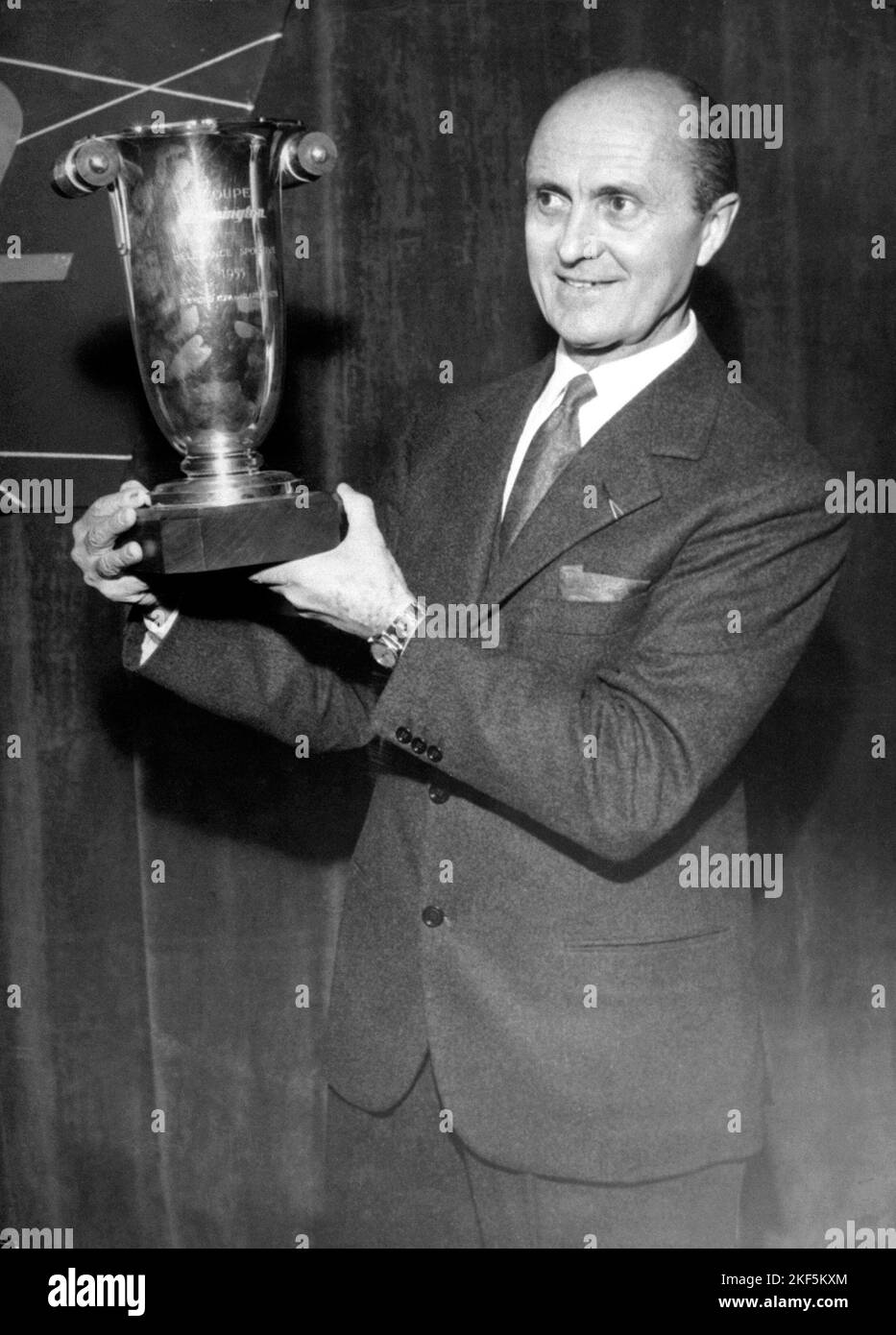 56 year old Formula One driver Louis Chiron lifts La Coupe Remington ...