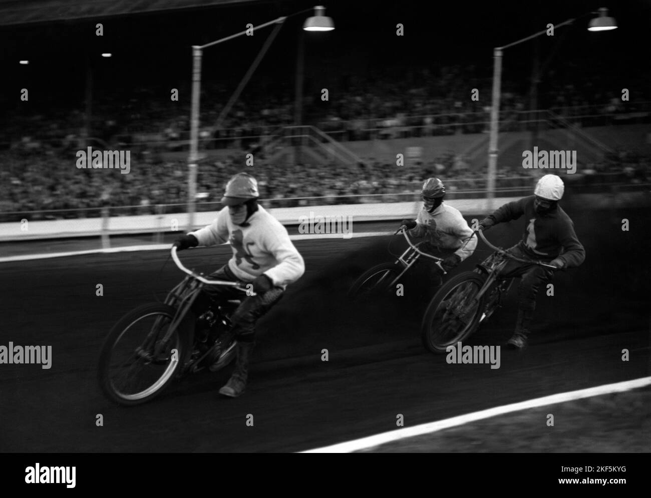 Eric French, left, leading Tommy Price and Graham Warren at speed Stock ...