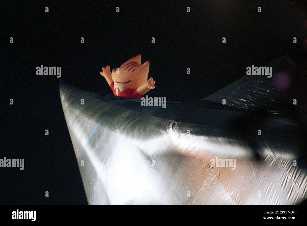 Cobi, the official mascot of the Barcelona Olympics, waves goodbye as ...