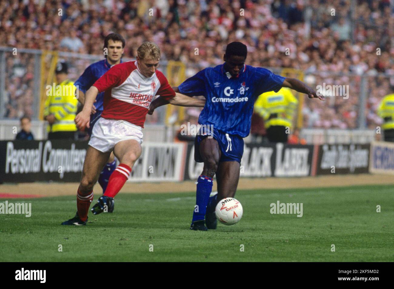 Chelsea's Ken Monkou gets away from Middlesbrough's Stuart Ripley ...