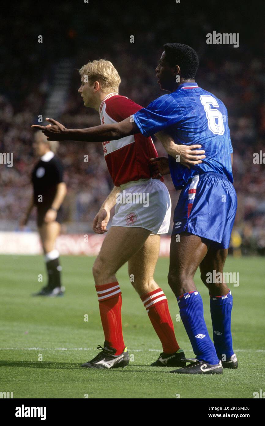 Chelsea player Ken Monkou marks Middlesbrough's Stuart Ripley closely ...