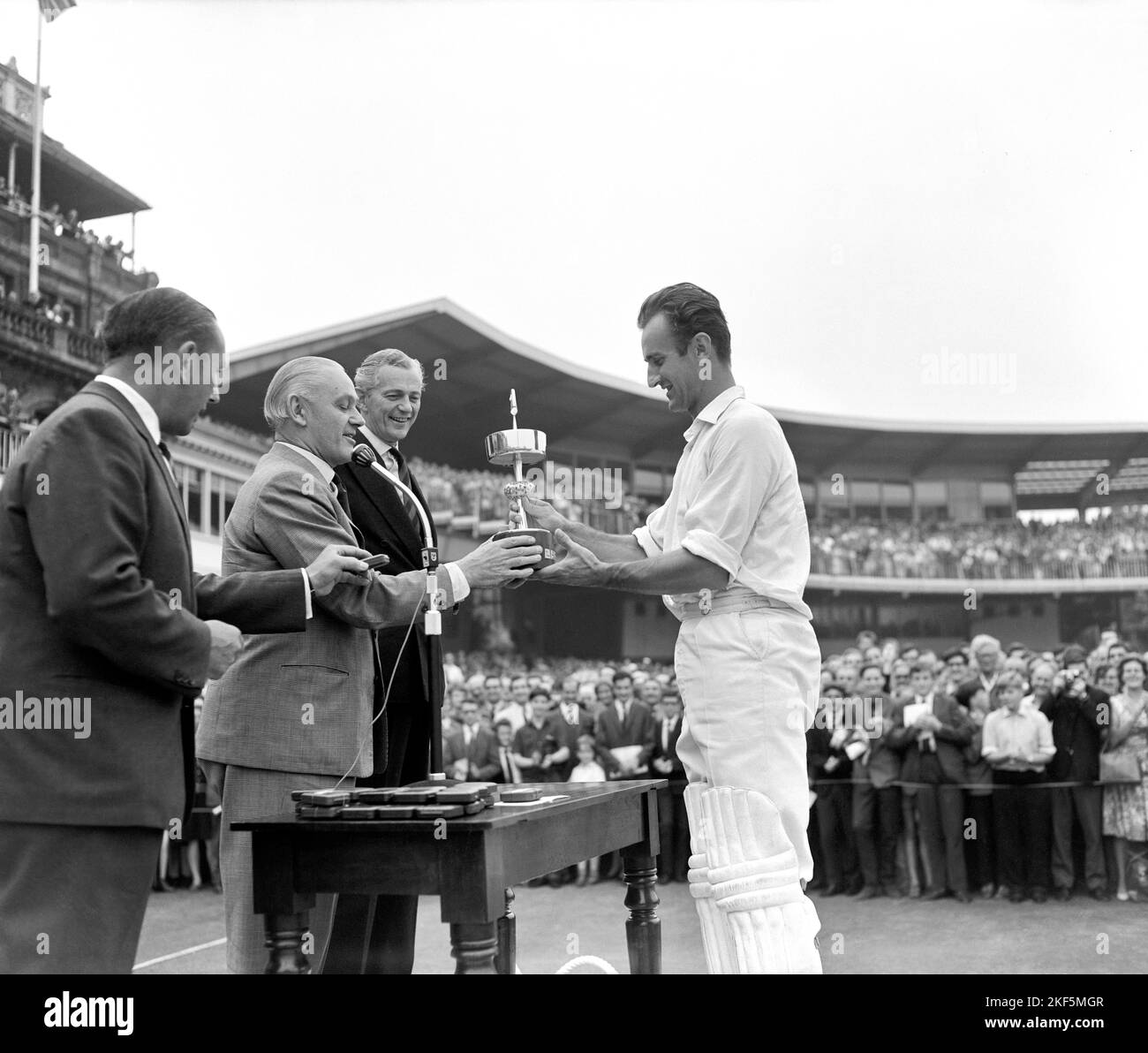 (L-R) MCC President Gubby Allen presents the Gillette Cup to the ...