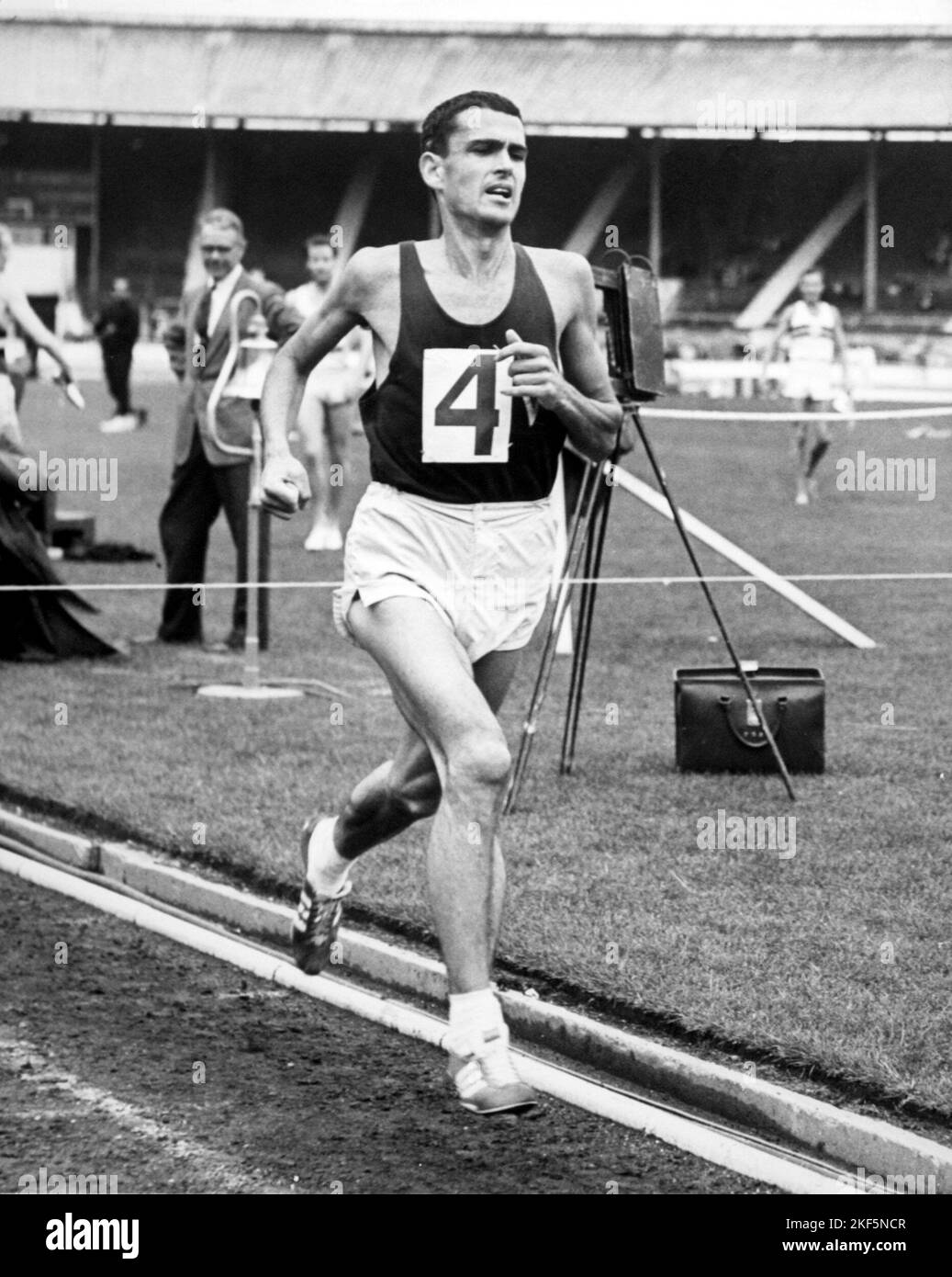 Ron Clarke (Australia) wins the 3 miles race, knocking 8 seconds off ...