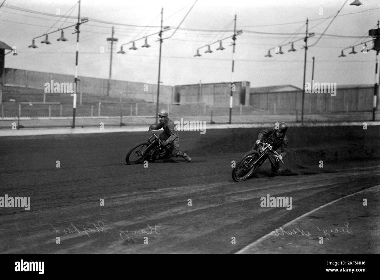 (L-R) New Cross riders Harry Shepherd and George Newton slide around ...