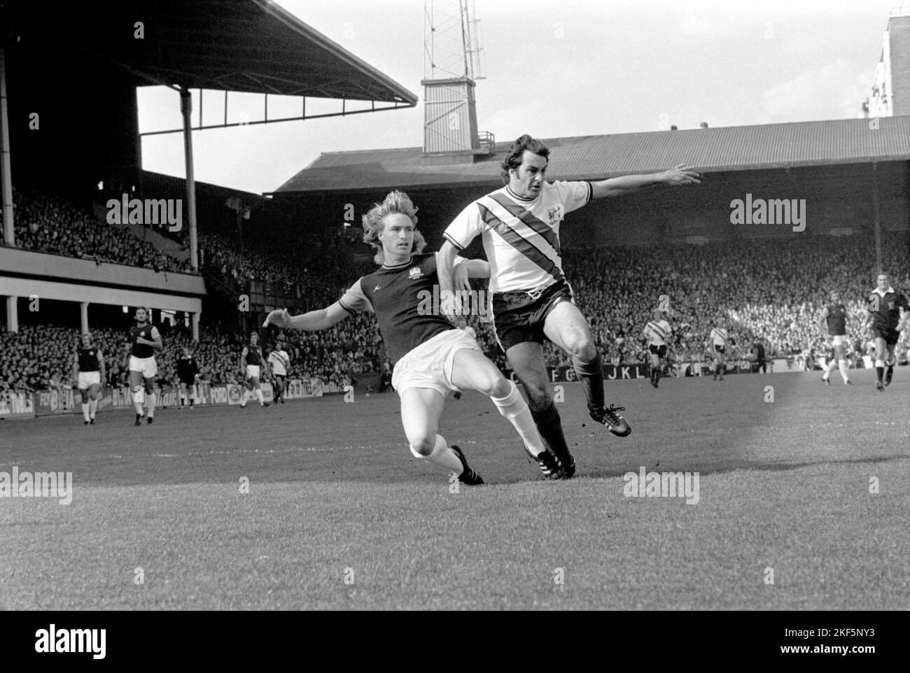 (L-R) West Ham United's Kevin Lock tackles Sheffield United's Tony ...