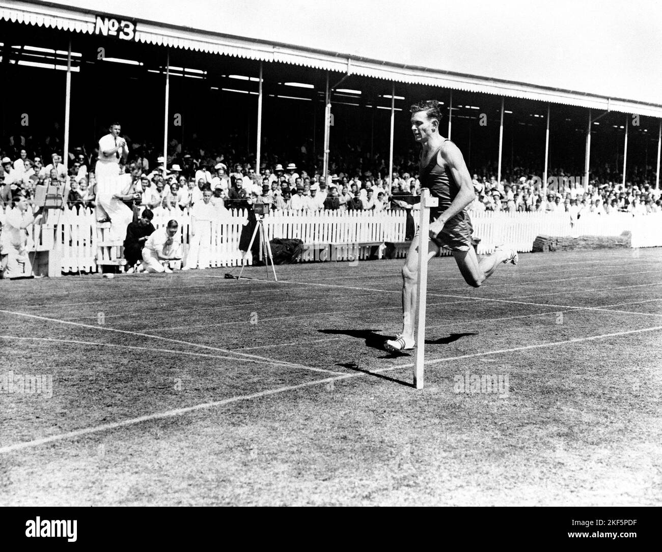 Peter Snell approaches the tape with the 880yds world record in his ...