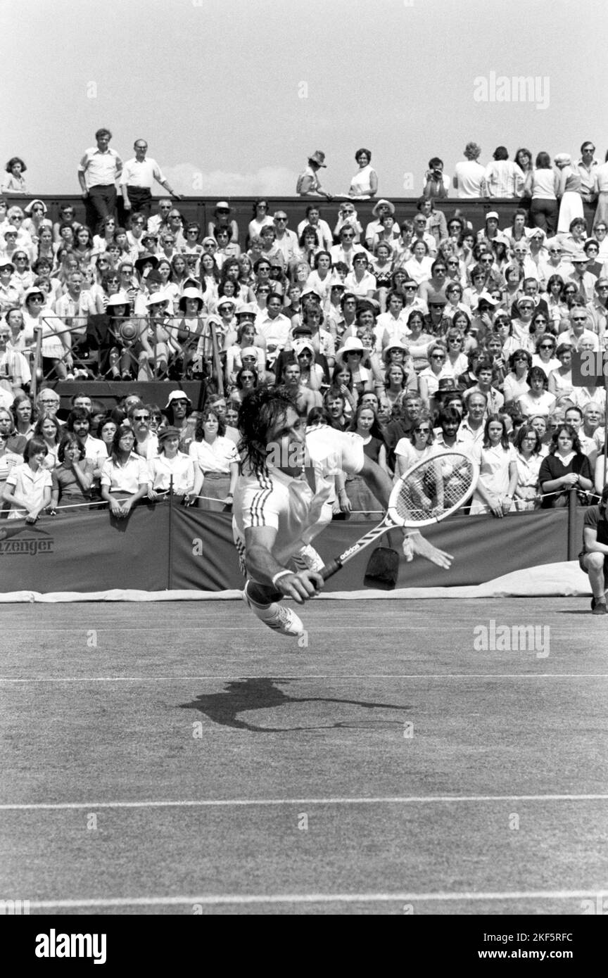 Ilie Nastase dives to return the ball Stock Photo - Alamy