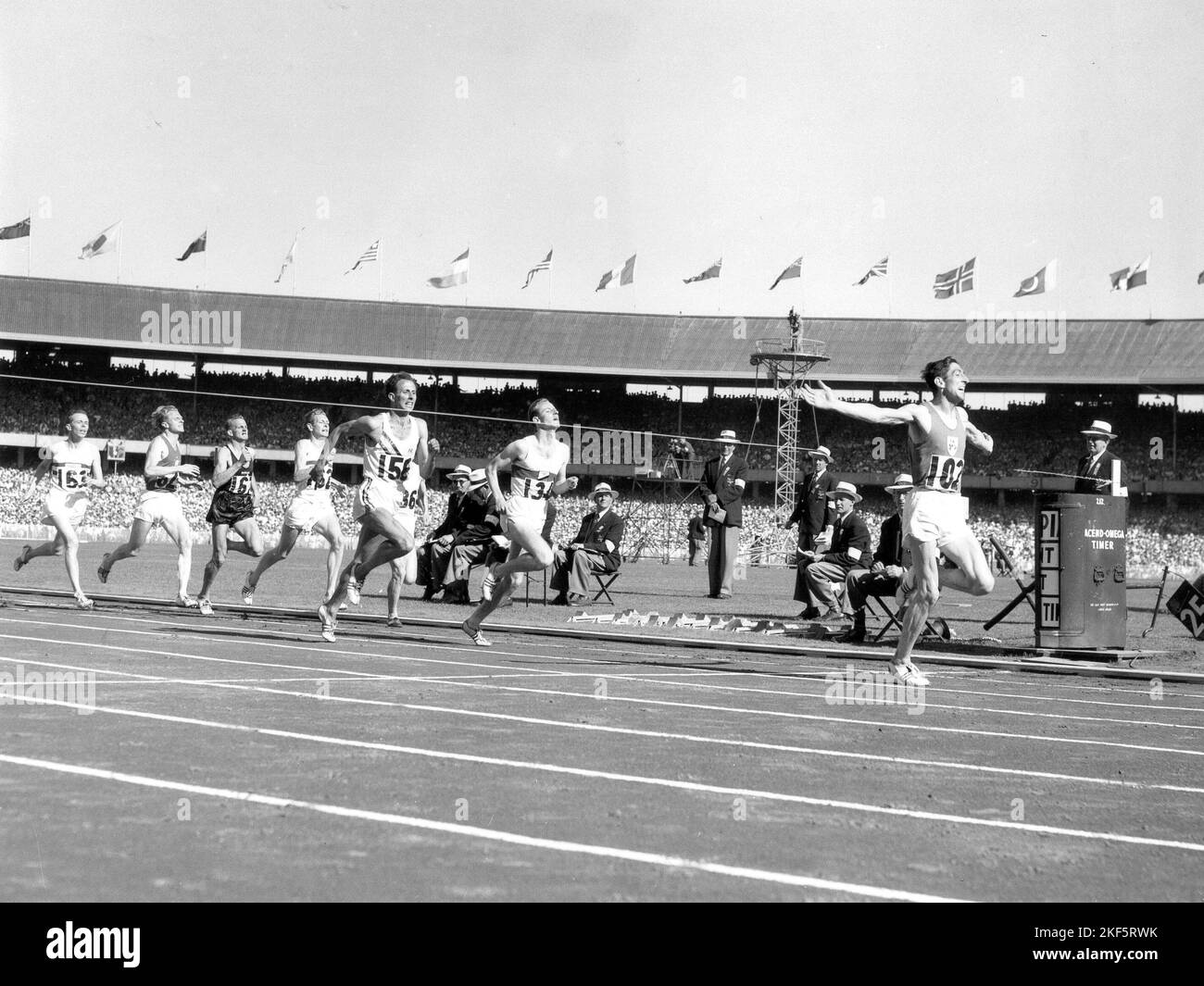 Ireland's Ron Delaney takes the gold medal in a new Olympic record of 3 ...