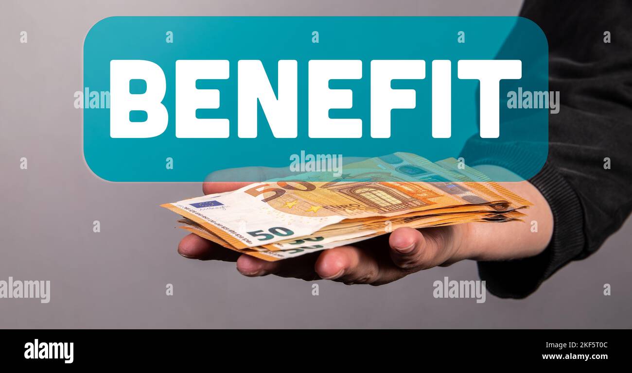 Benefit. Pile of euro money in a woman's hand Stock Photo - Alamy