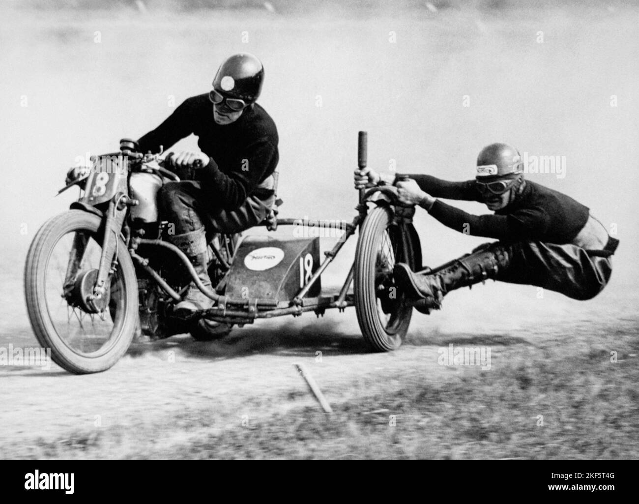 Brian Ducker and his passenger navigate the corner in spectacular style ...